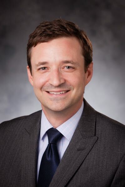 Duke germ doctor putting a microscope on COVID-19 - 9th Street Journal